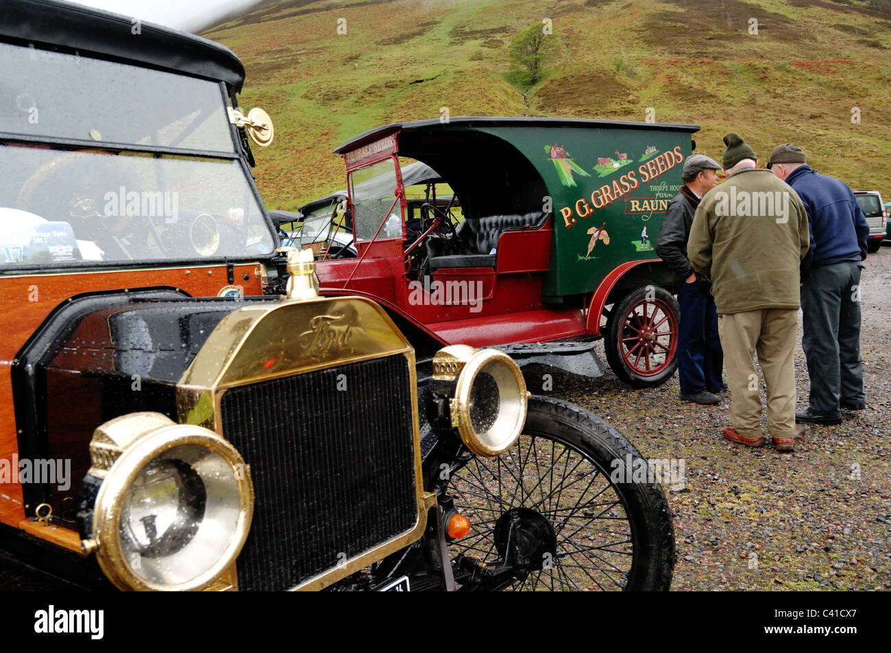 Model T Fords parked in Glen Roy Scottish Highlands during tour of the ...