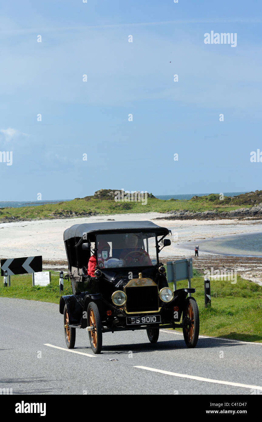 Model T Ford drives along the coast road to the isles Scottish ...
