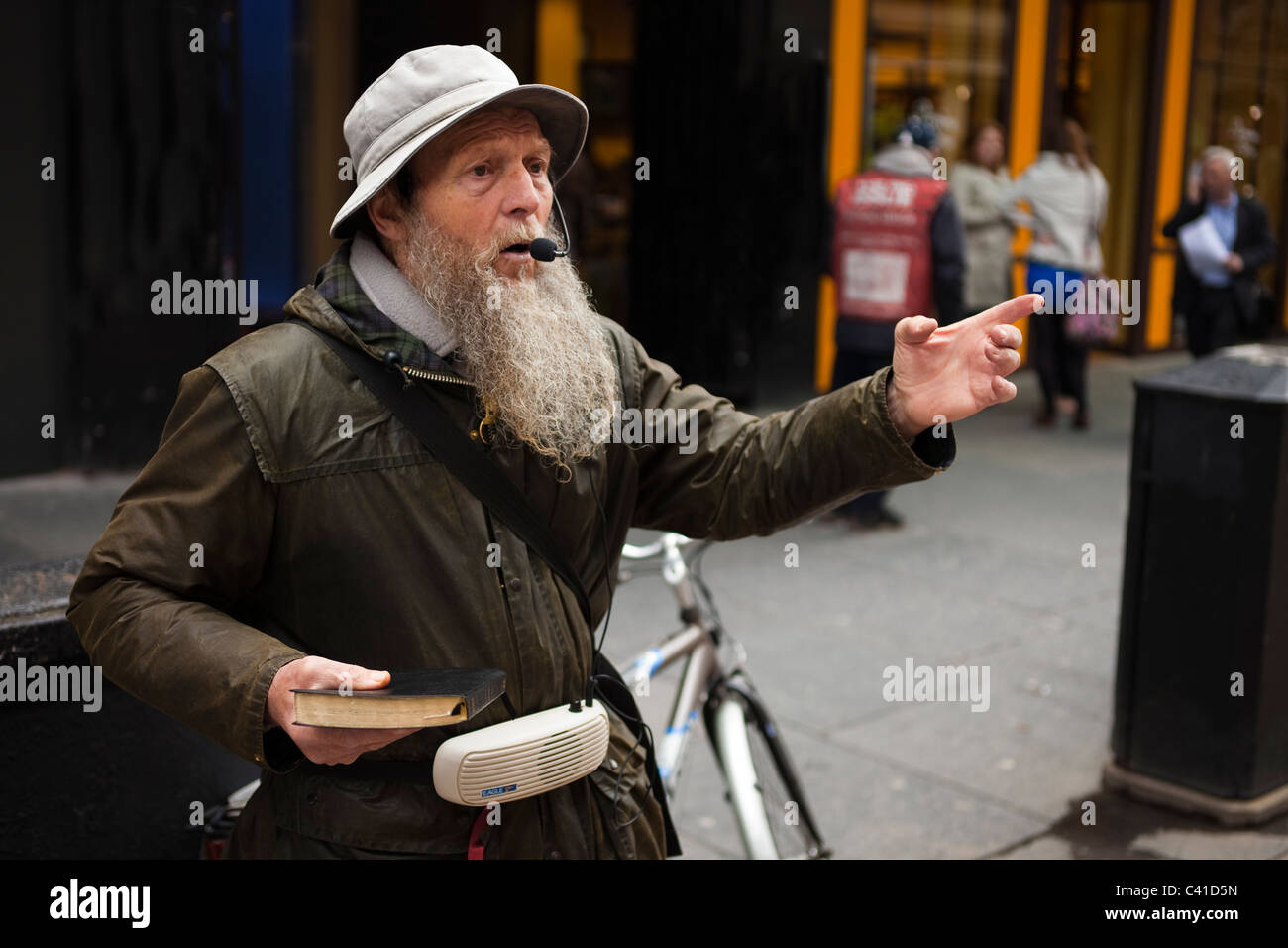 Elderly man preaching christianity in hi-res stock photography and ...