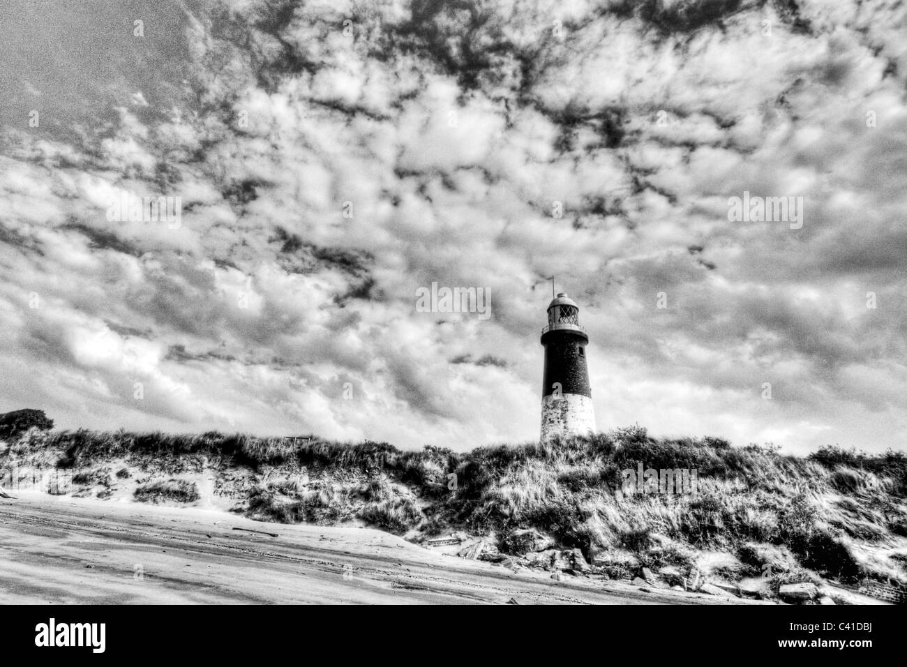 Derelict Spurn Point lighthouse on the river Humber Estuary dramatic ...