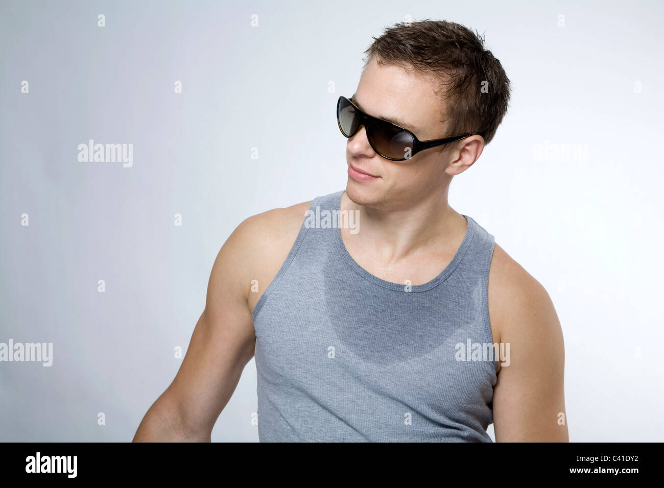Young Sweating Man With Sunglasses Stock Photo - Alamy