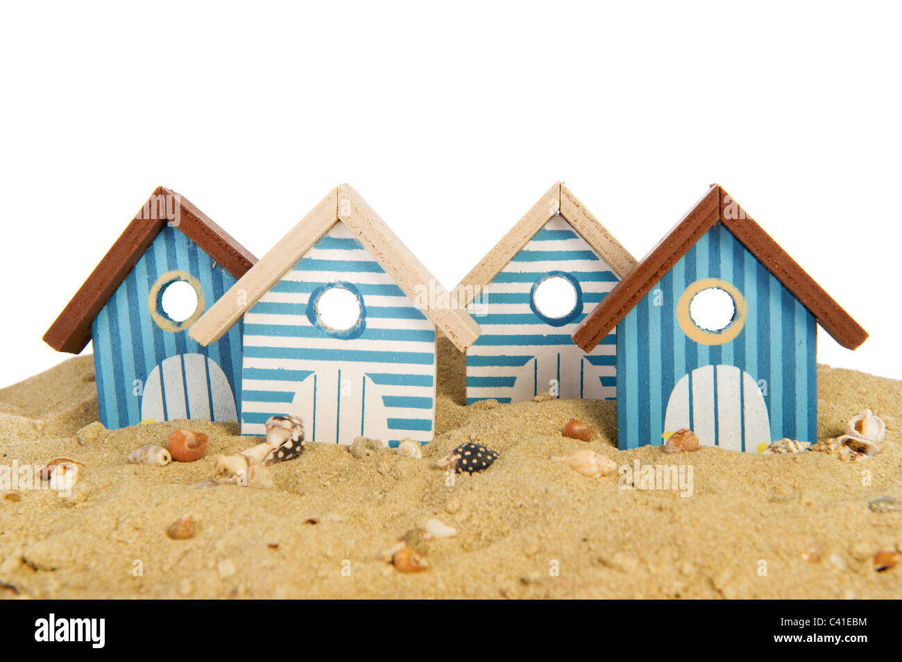 row striped beach huts in the sand Stock Photo - Alamy