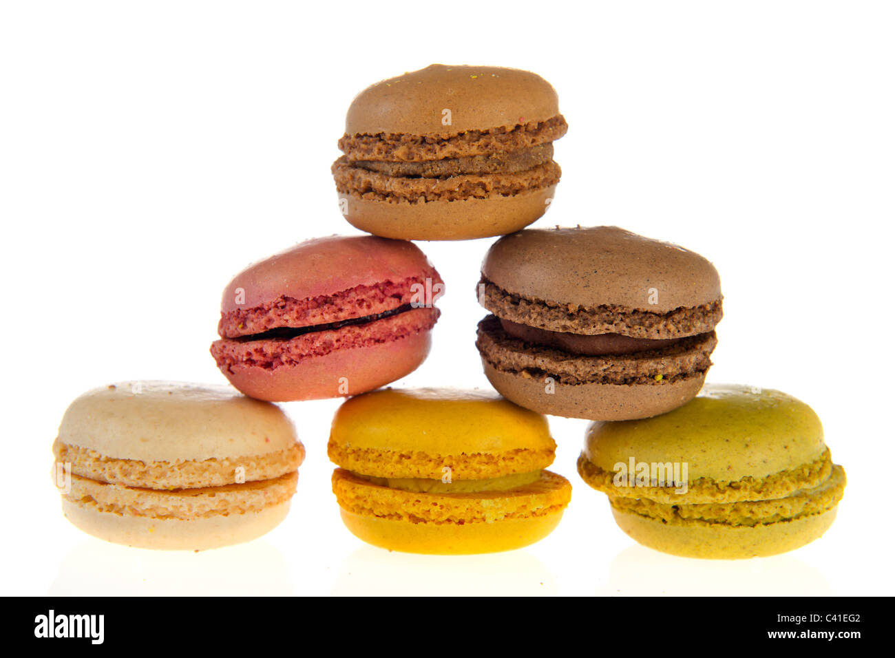 Colorful French macarons isolated over white background Stock Photo - Alamy