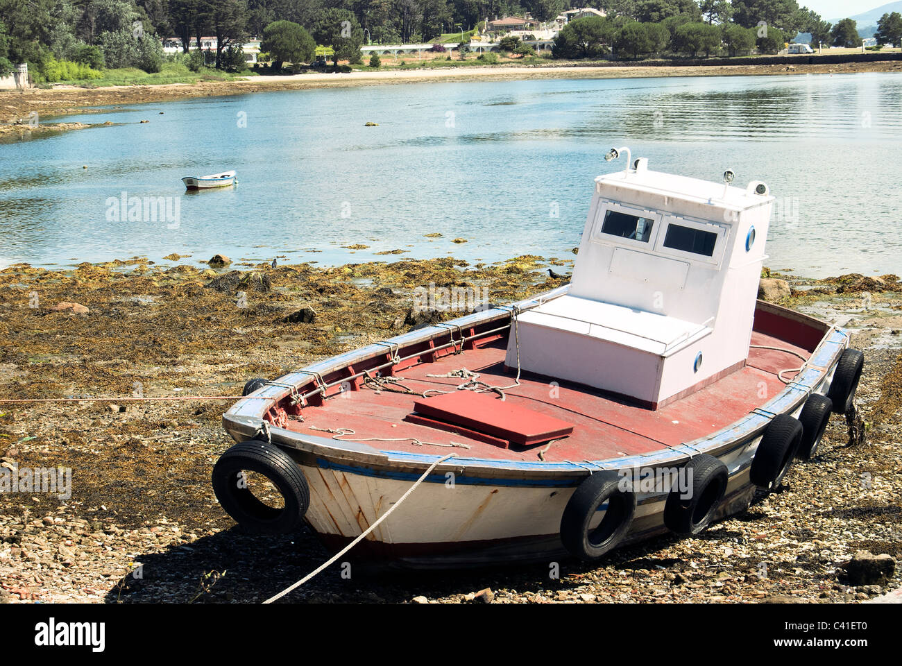 Ship on the sand Stock Photo - Alamy