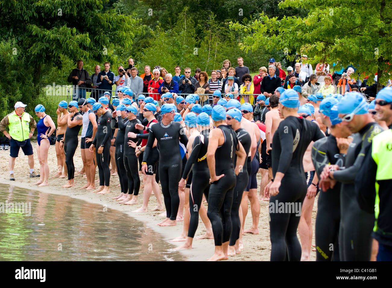 Triathlon competition. Swim contest starts Stock Photo - Alamy