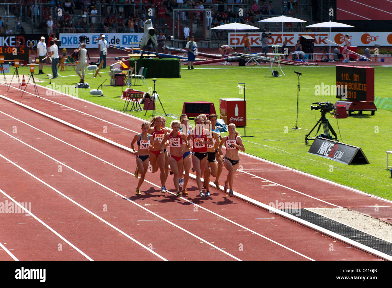 High resolution image of a bunch of athletics running in the stadium ...