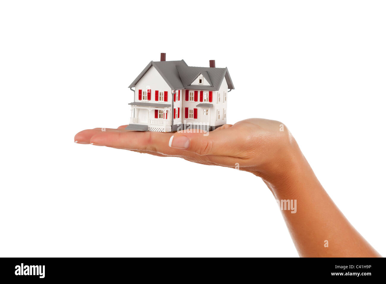 Model House in Female Hand Isolated on a White Background Stock Photo ...