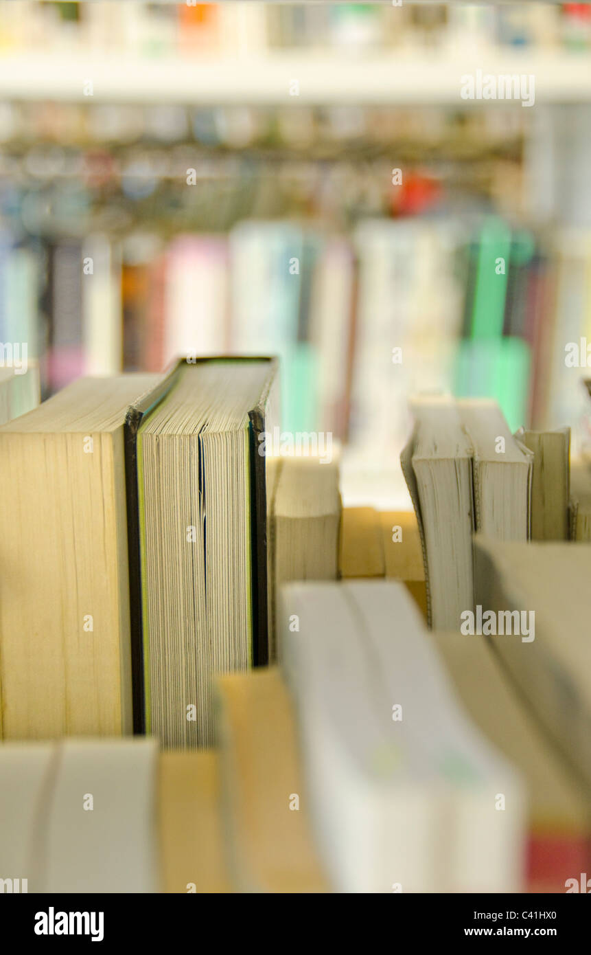Books on multiple bookshelves, Library, UK Stock Photo - Alamy