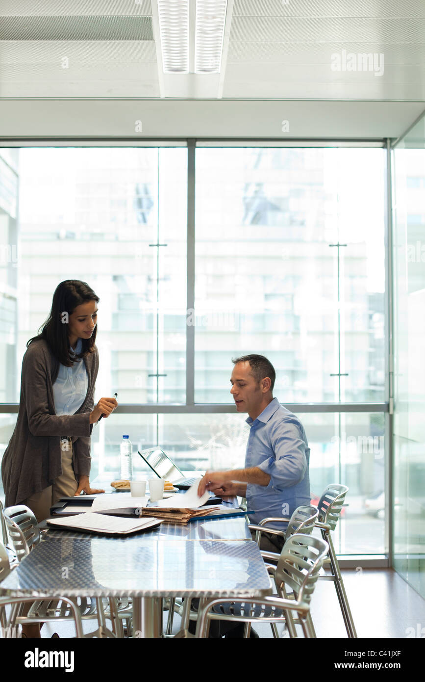 Colleagues discussing work Stock Photo - Alamy
