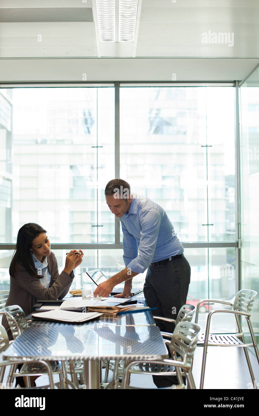 Colleagues discussing work Stock Photo - Alamy