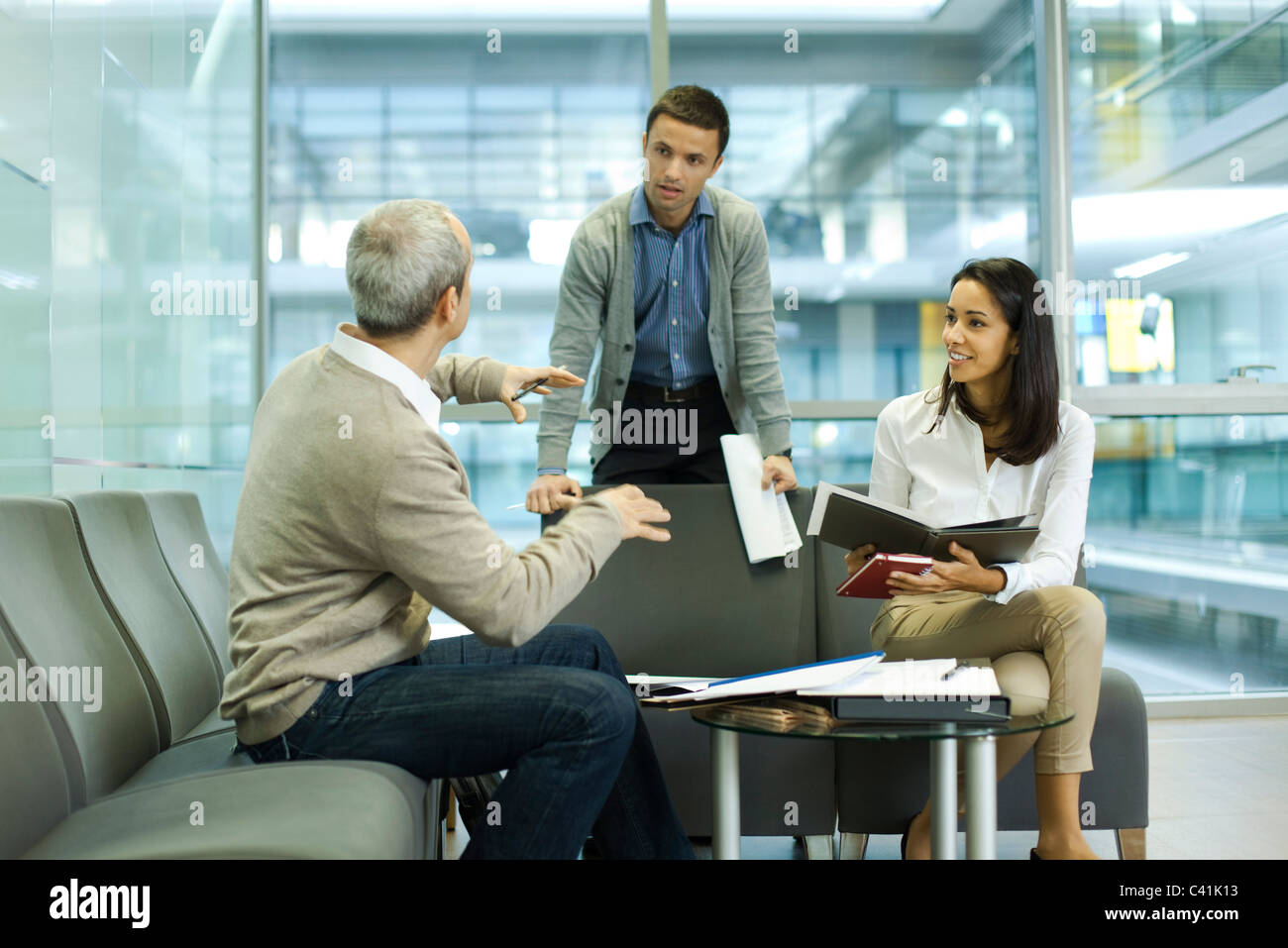 Women Crossing Legs In Office High Resolution Stock Photography and ...