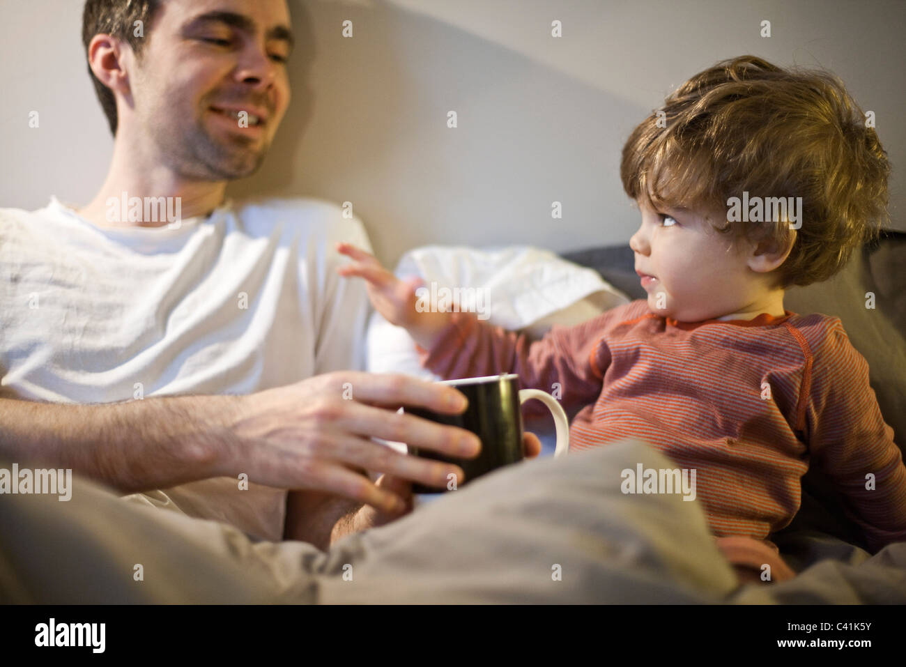 Father bonding with toddler son Stock Photo - Alamy