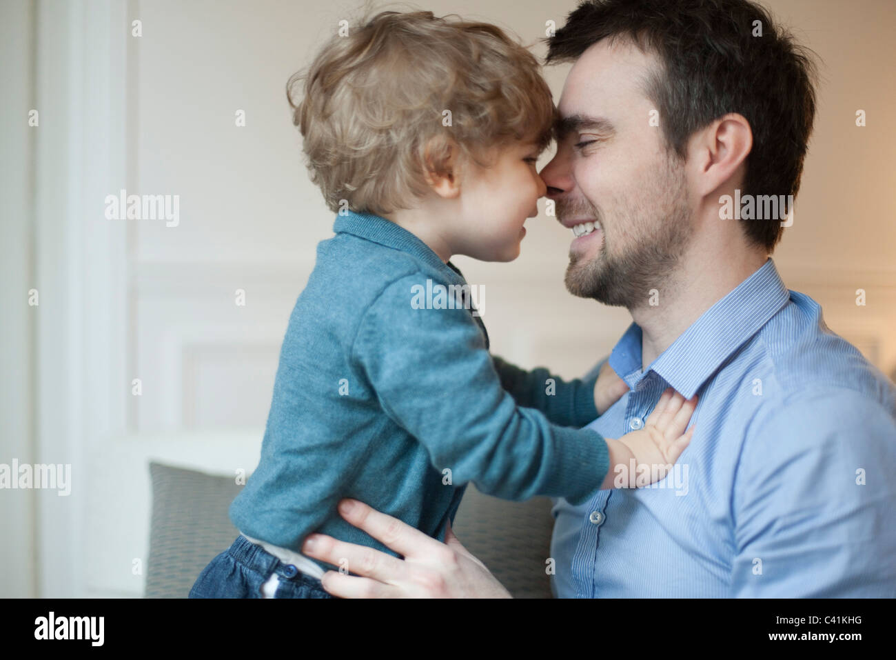 Father and toddler son nuzzling Stock Photo - Alamy