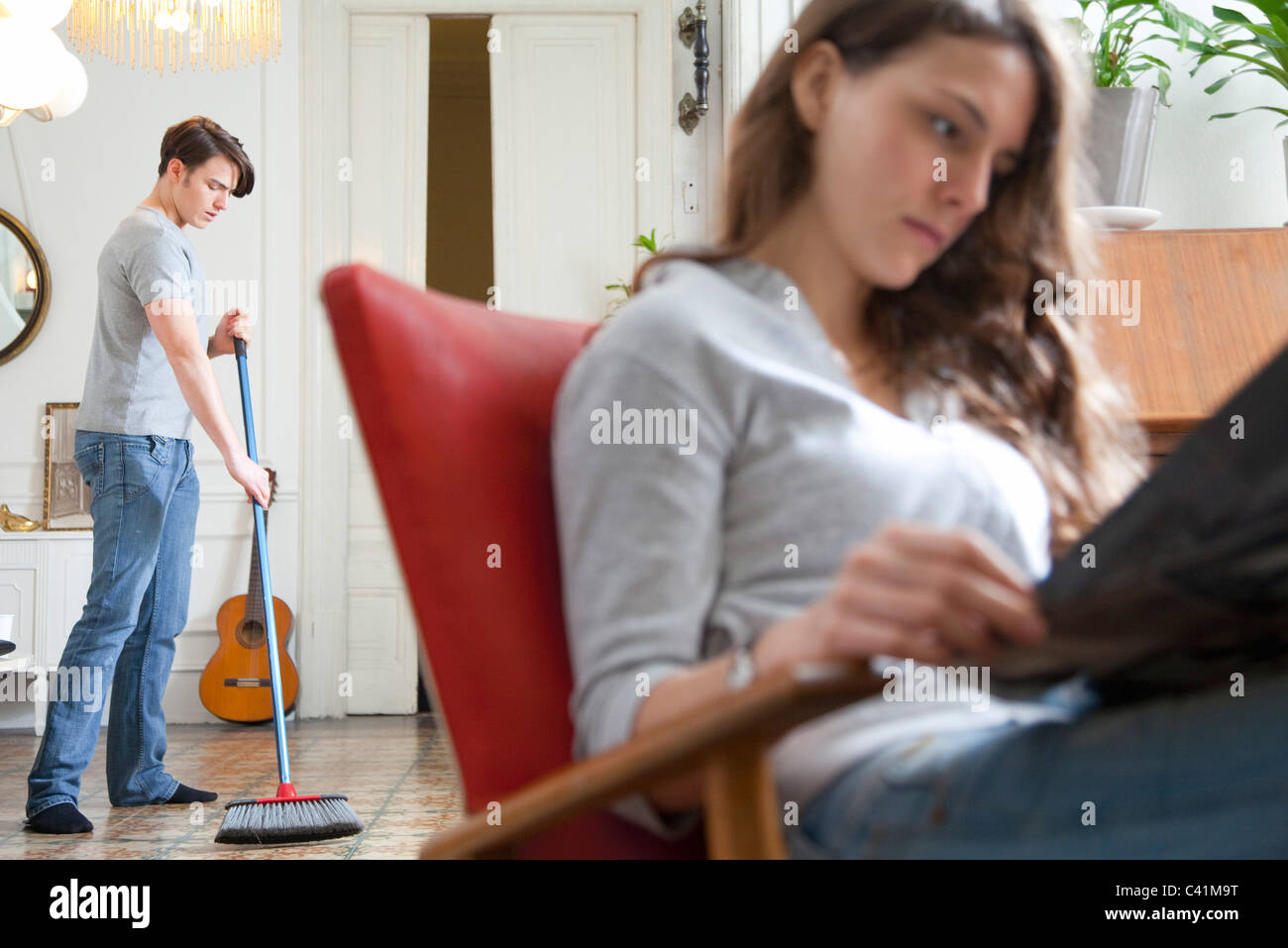 Husband sweeping hi-res stock photography and images - Alamy