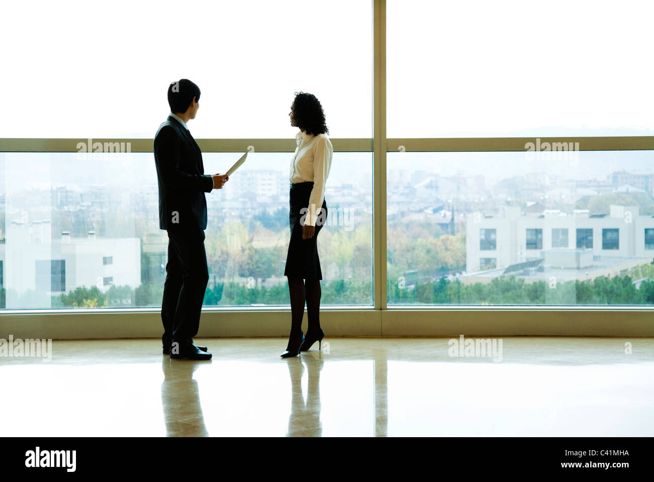 Two People Facing Each Other Talking High Resolution Stock Photography ...