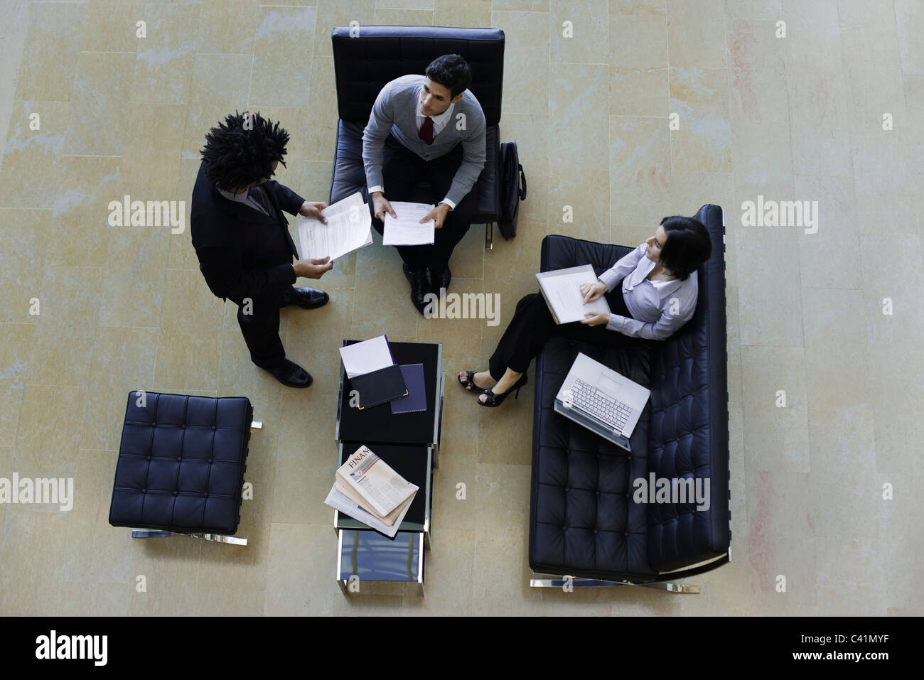 Executives working together, overhead view Stock Photo - Alamy