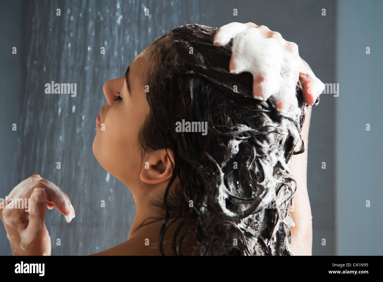 Woman washing her hair hi-res stock photography and images - Alamy