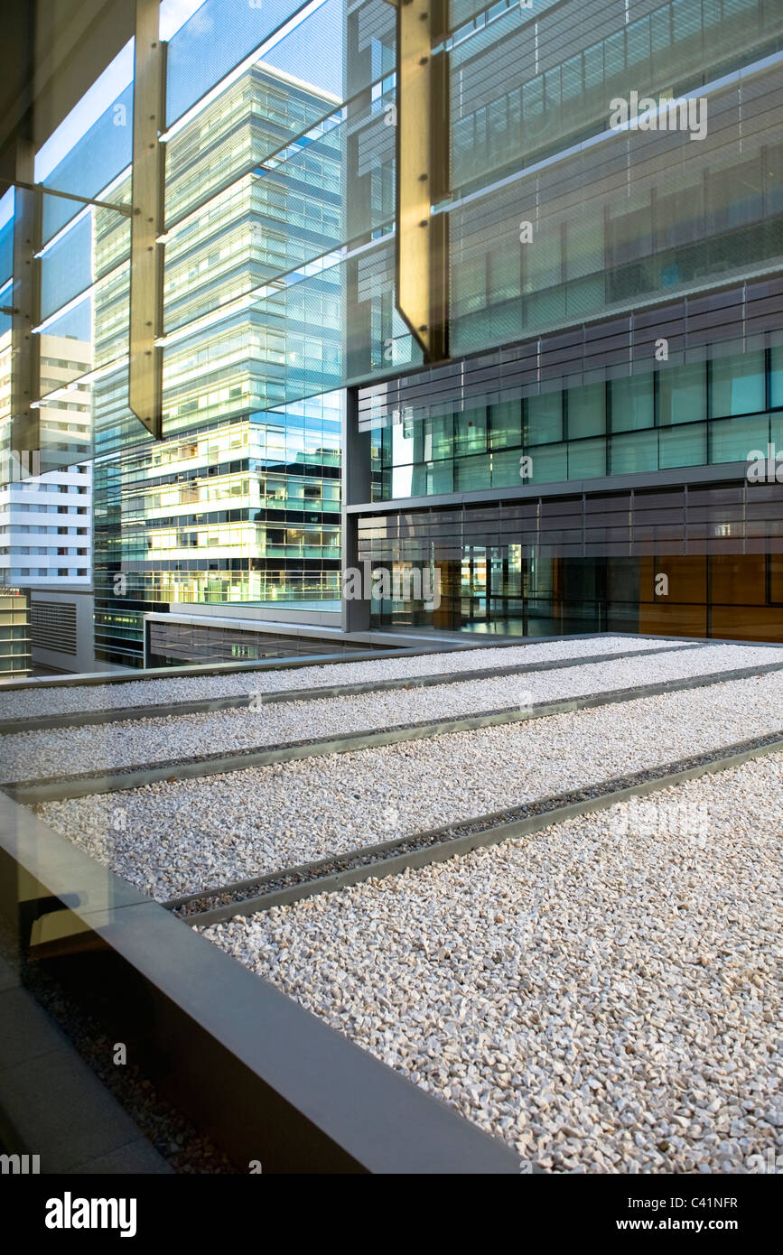 Roof of office building seen through window Stock Photo - Alamy