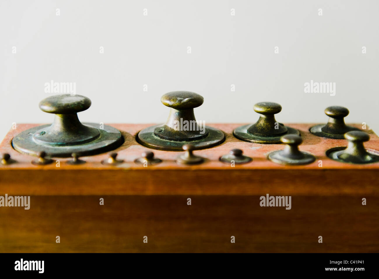 Scale weights of different sizes Stock Photo - Alamy