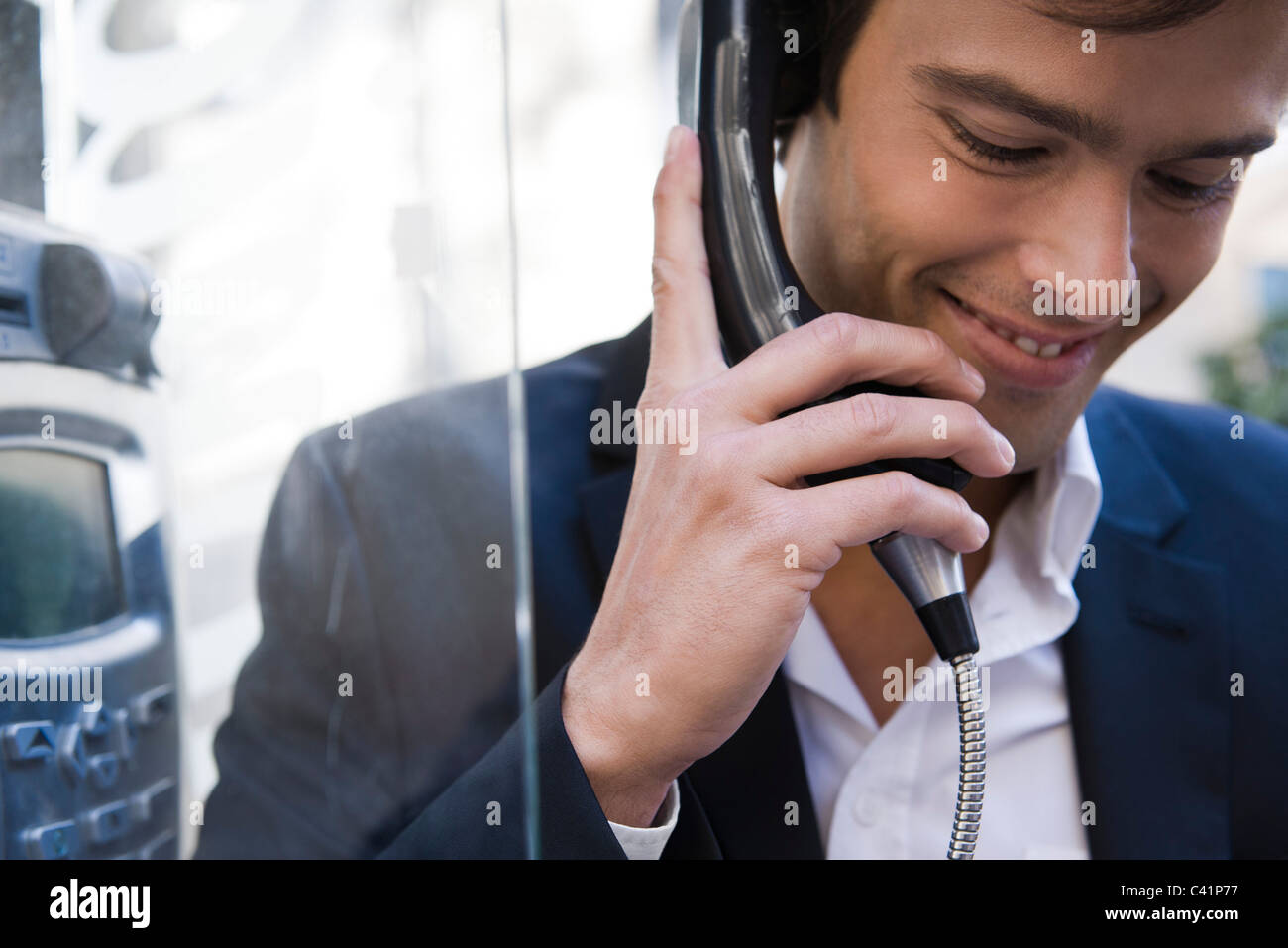 Man using pay phone Stock Photo - Alamy