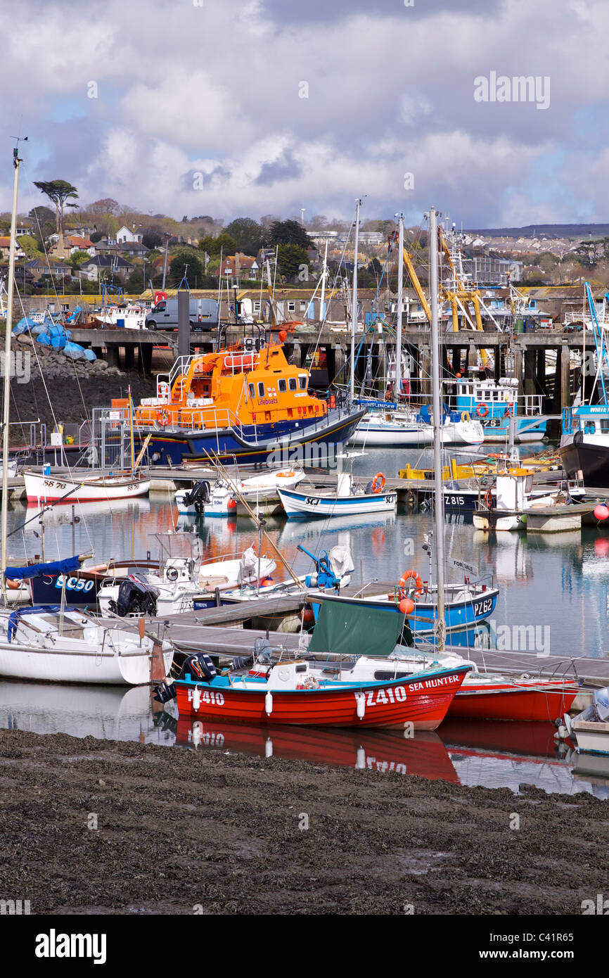 Newlyn harbour at low tide with the RNLI Penlee lifeboat and other ...