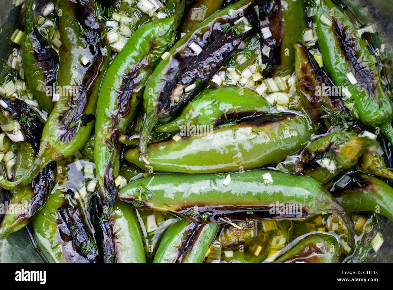 whole griddled marinated Serrano Peppers Stock Photo - Alamy