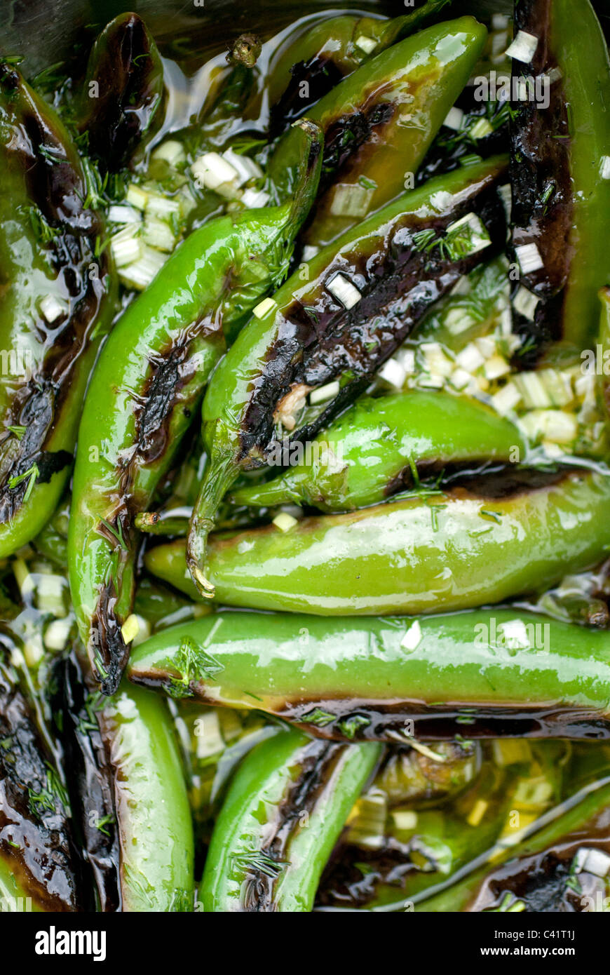 whole griddled marinated Serrano Peppers Stock Photo - Alamy