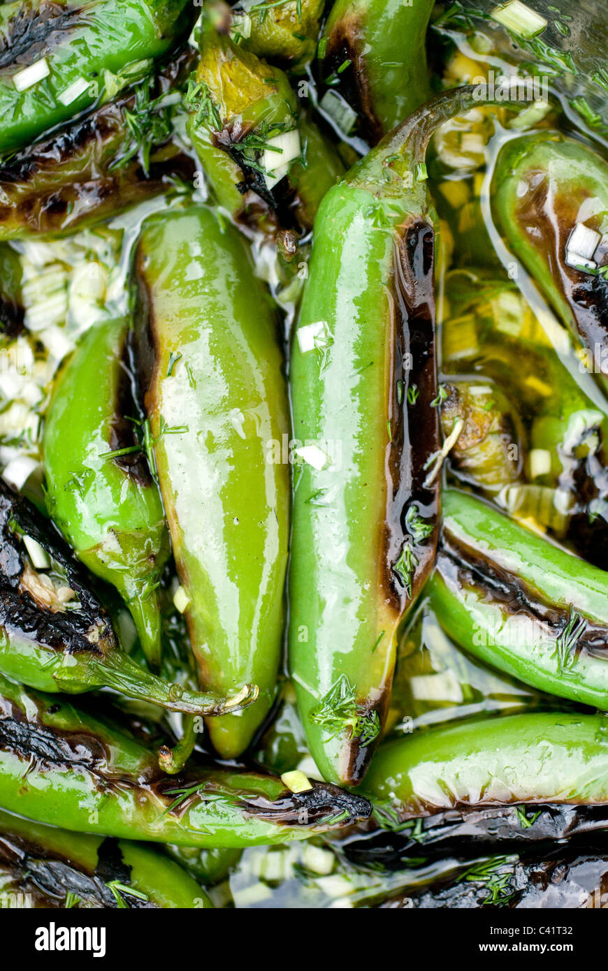 whole griddled marinated Serrano Peppers Stock Photo - Alamy