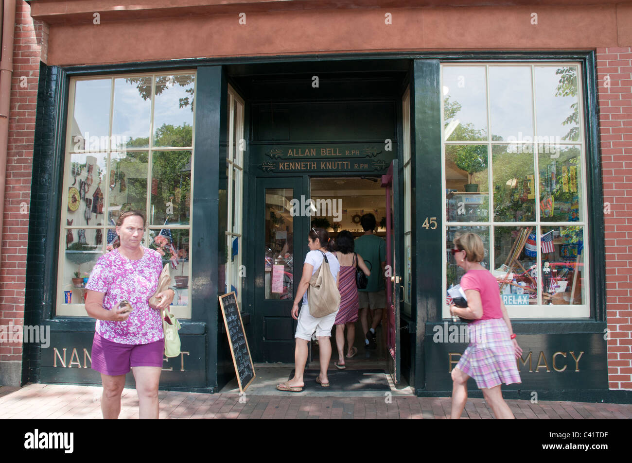 People walk past shops in Nantucket Town Stock Photo - Alamy