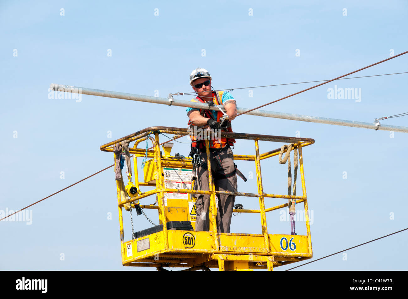 Installing the overhead power line equipment on the Manchester ...