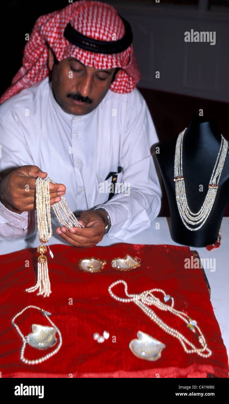 Arab and pearls in a shop in Bahrain Stock Photo - Alamy
