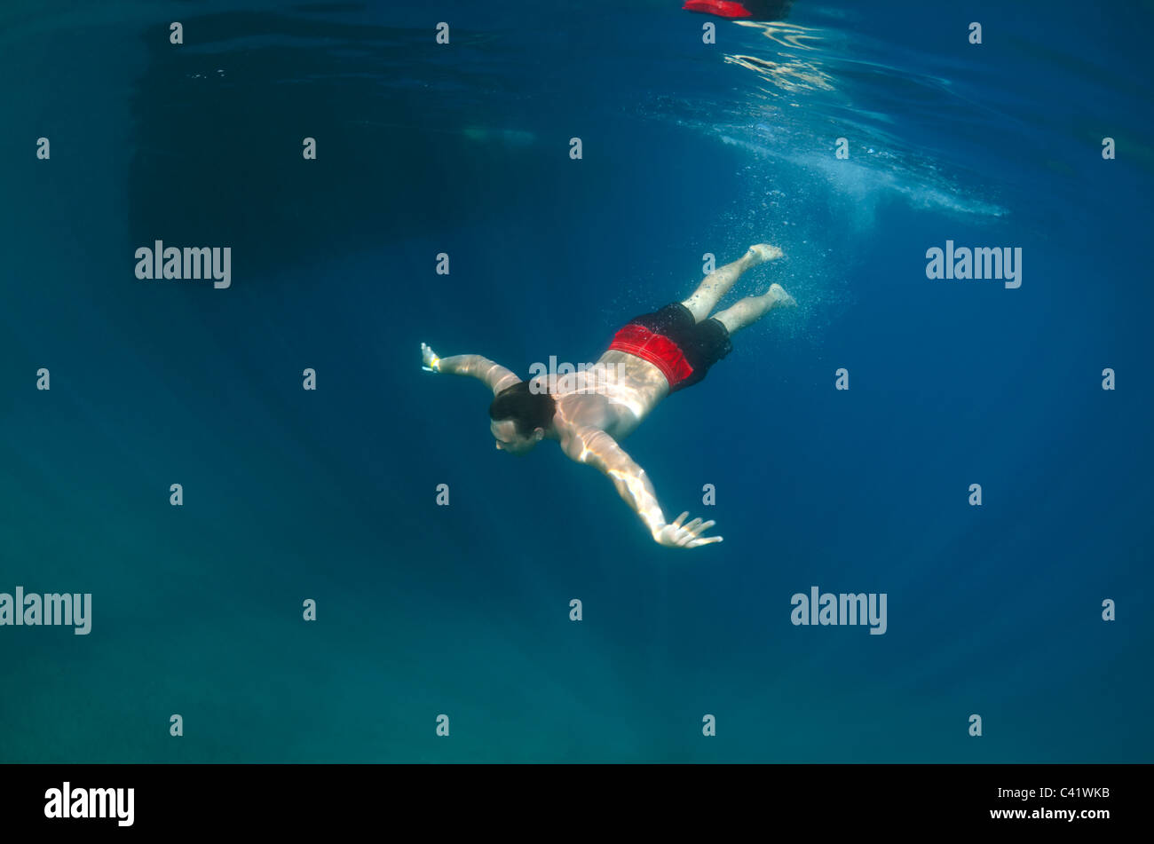 Man diving, Cleopatra island (Sedir Island), Aegean Sea, Turkey Stock ...