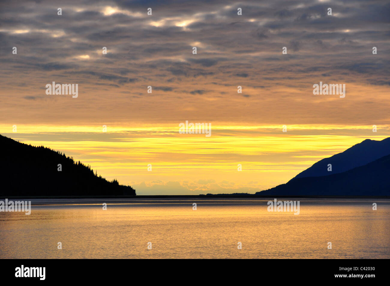 Overcast sky with Golden sunset Stock Photo - Alamy