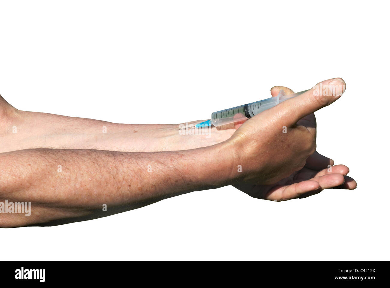 Man injecting with a syringe into own arm. On white background Stock ...