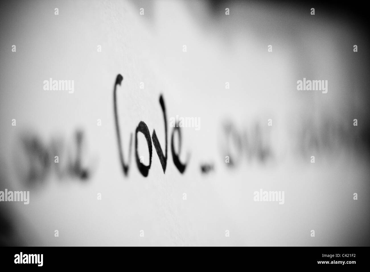 love written in calligraphy with shallow depth of field Stock Photo - Alamy