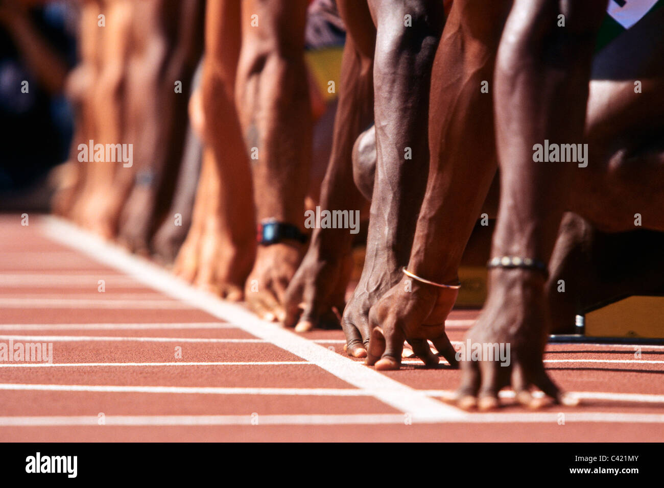 Detail of hands at the start of 100m race Stock Photo - Alamy