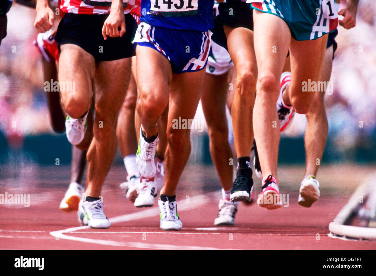 Detail of runners legs competing in a race Stock Photo - Alamy