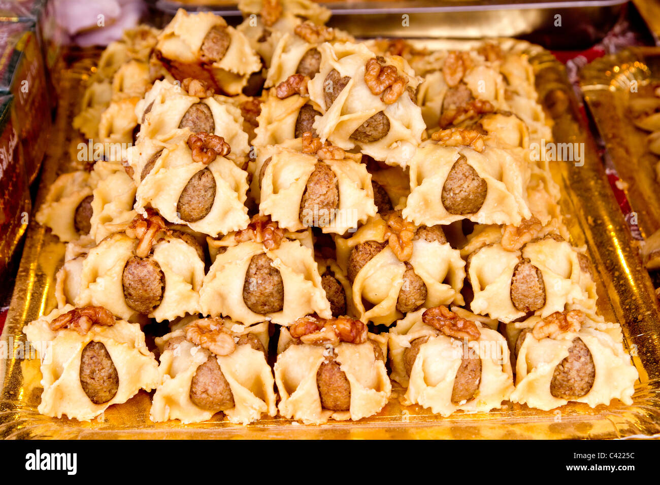 arab sweet pastries cakes stacked bakery with nuts Stock Photo - Alamy
