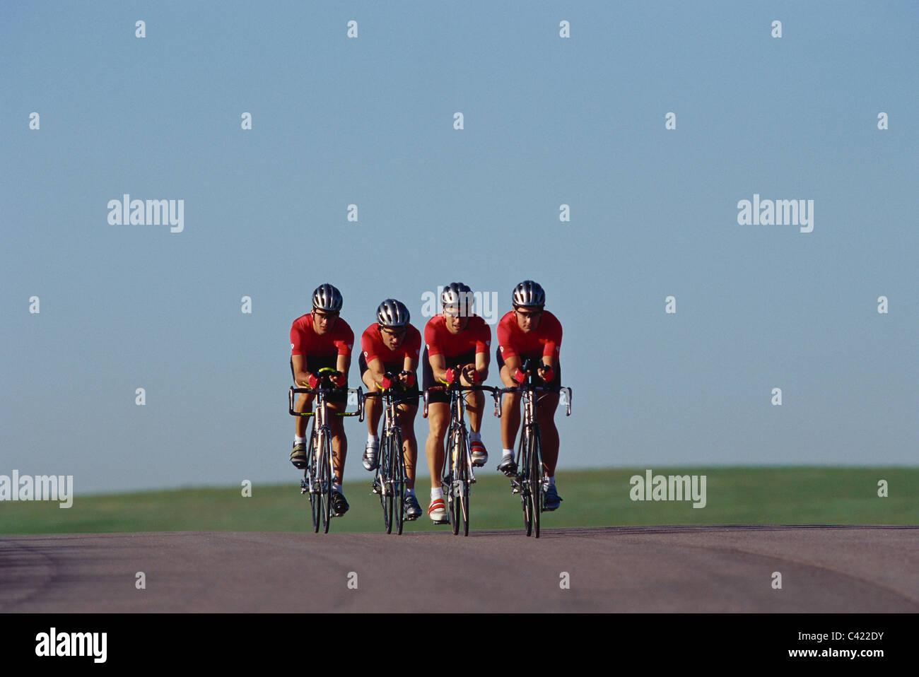 Road cycling team in action Stock Photo - Alamy