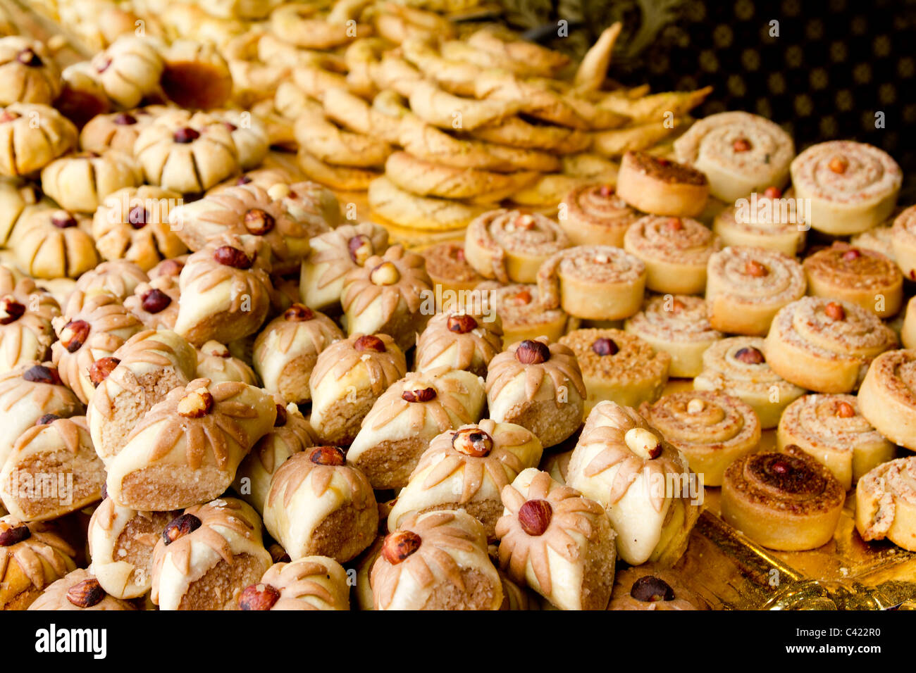 arab sweet pastries cakes stacked bakery with nuts Stock Photo - Alamy