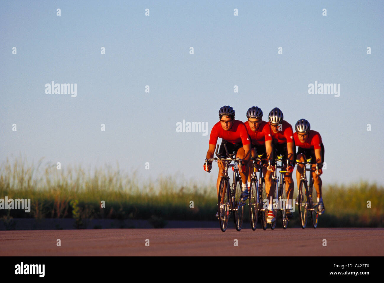 Road cycling team in action Stock Photo - Alamy