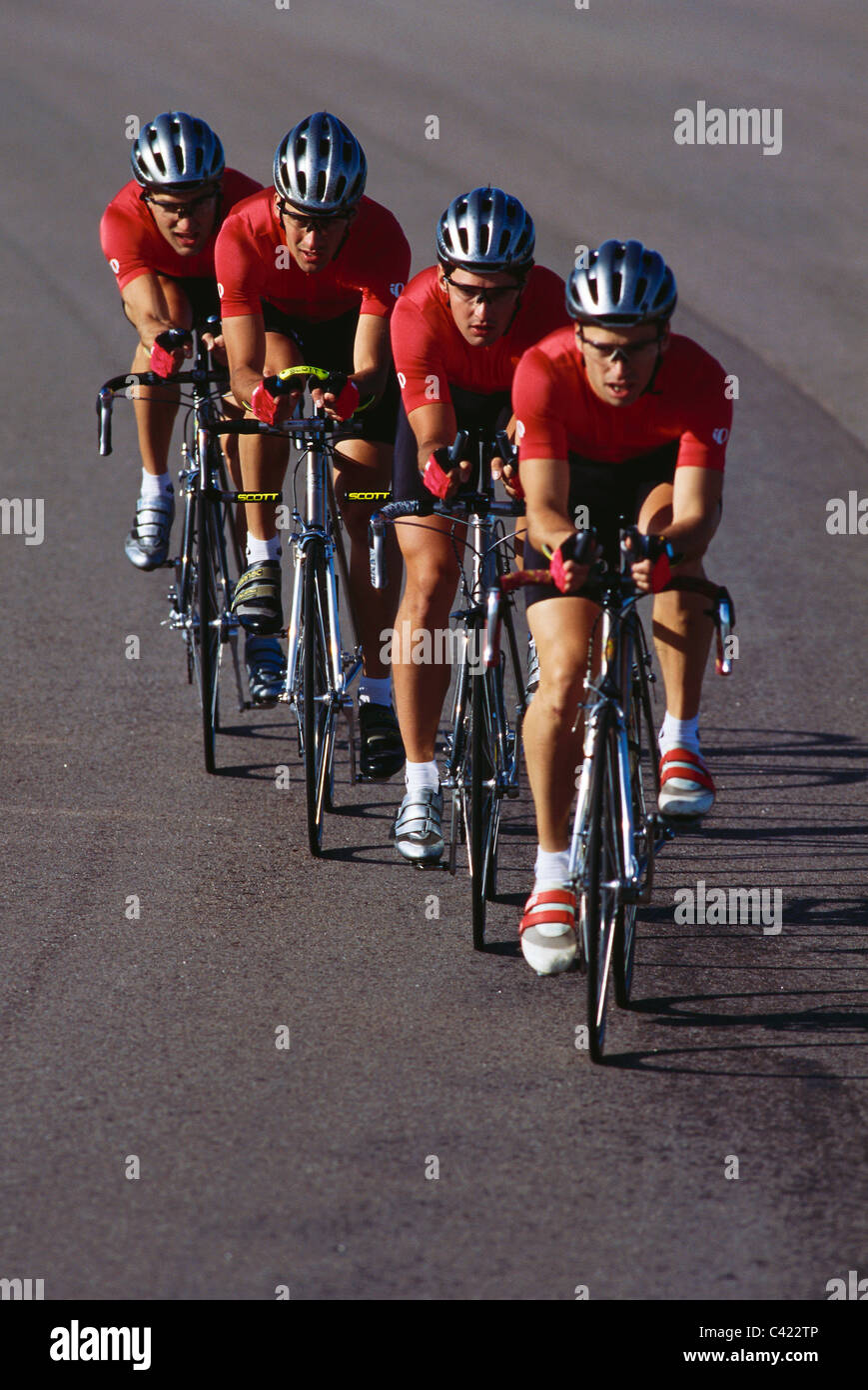 Road cycling team in action Stock Photo - Alamy