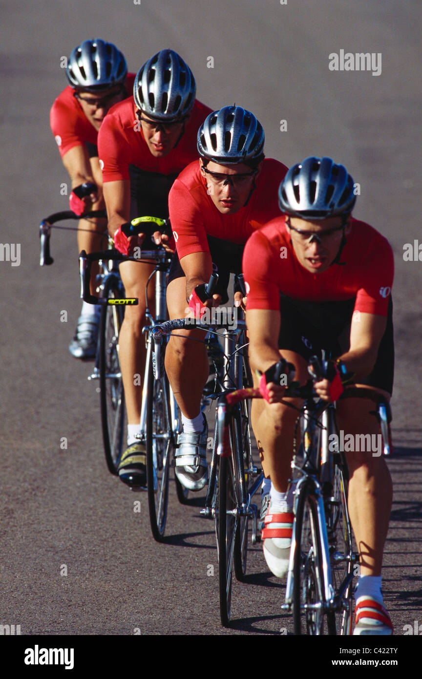 Road cycling team in action Stock Photo - Alamy