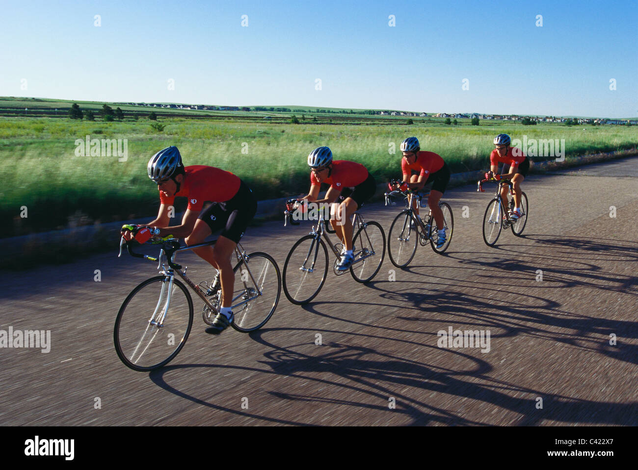 Road cycling team in action Stock Photo - Alamy