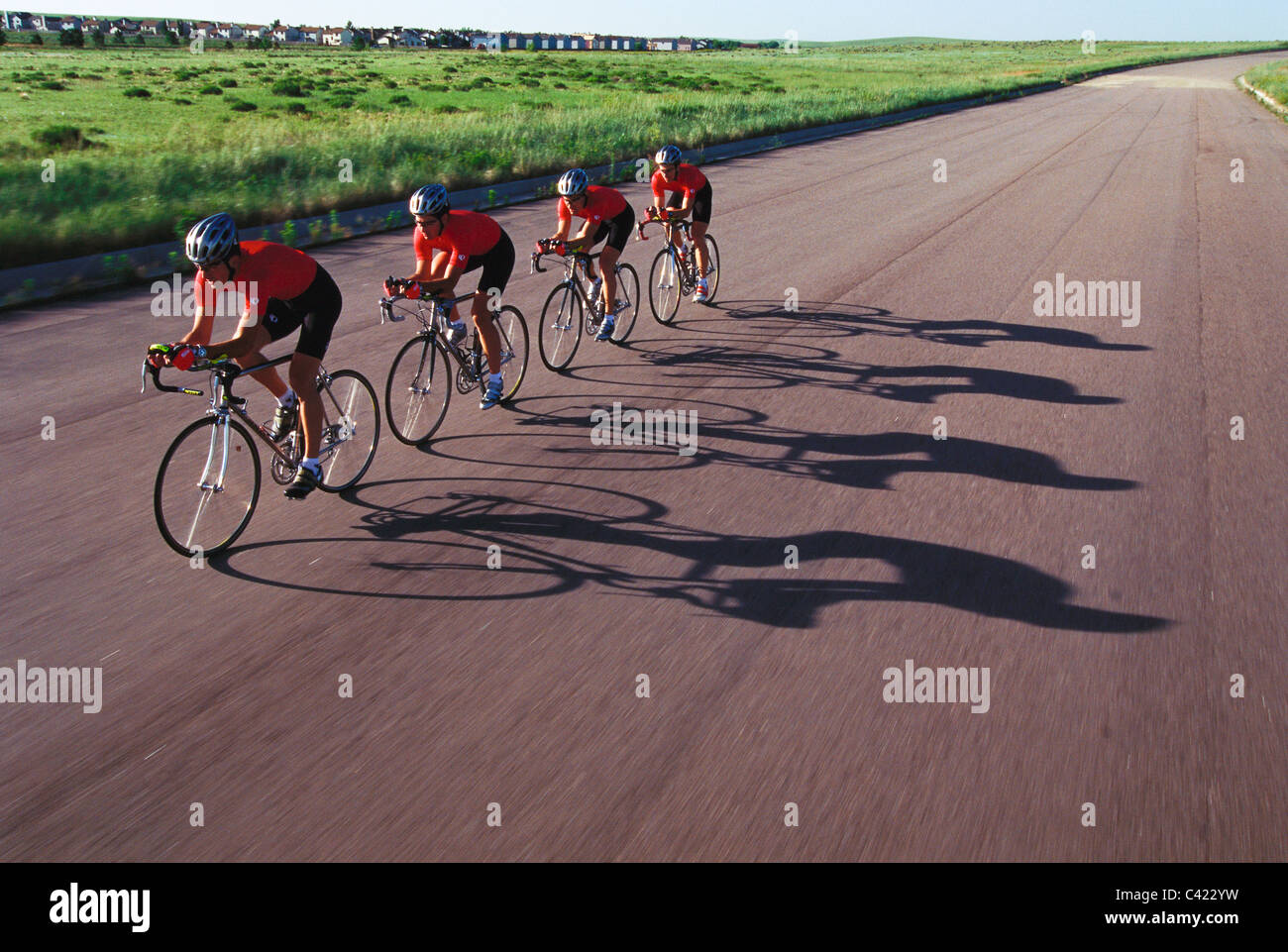 Road cycling team in action Stock Photo - Alamy