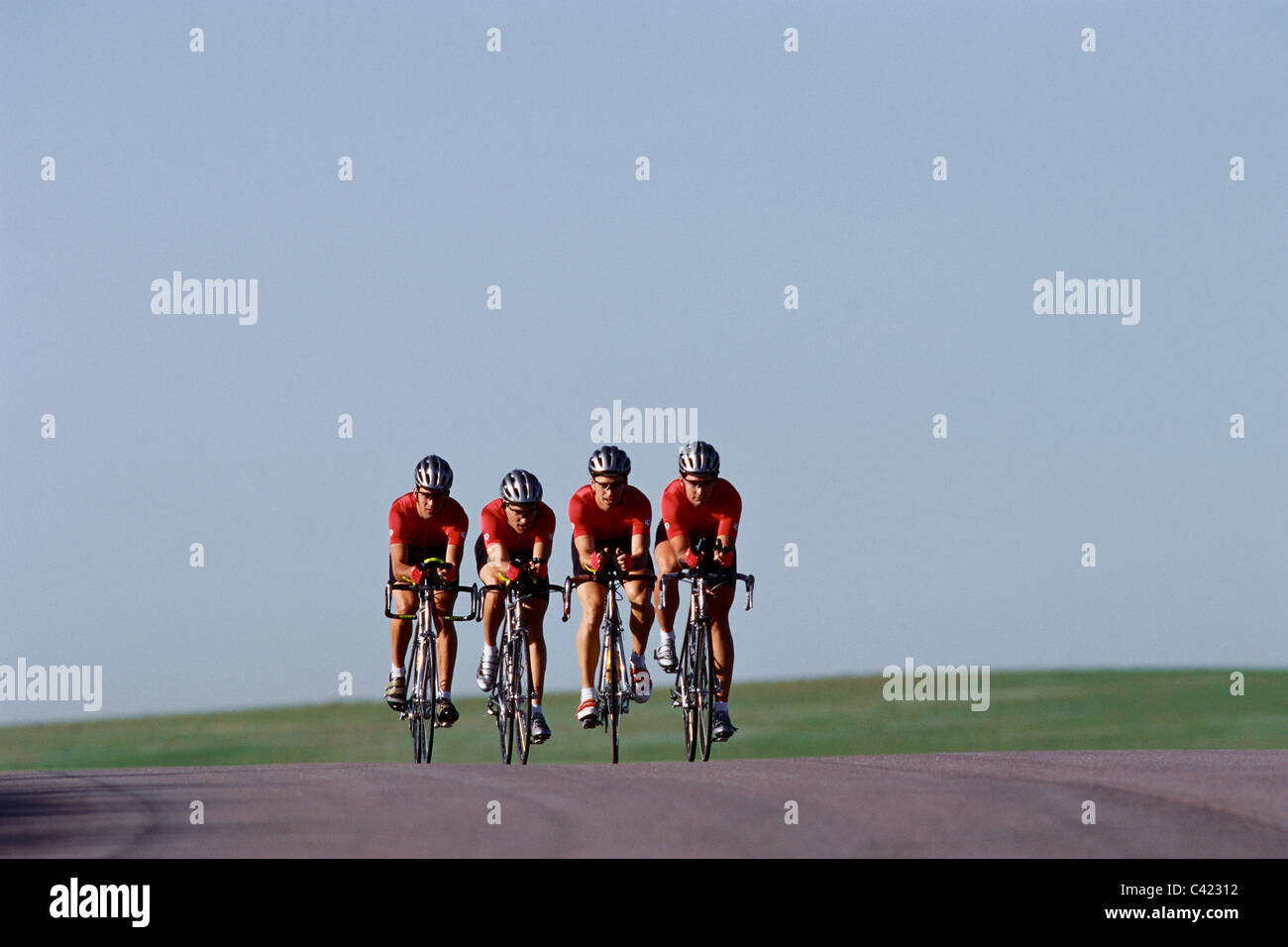 Road cycling team in action Stock Photo - Alamy