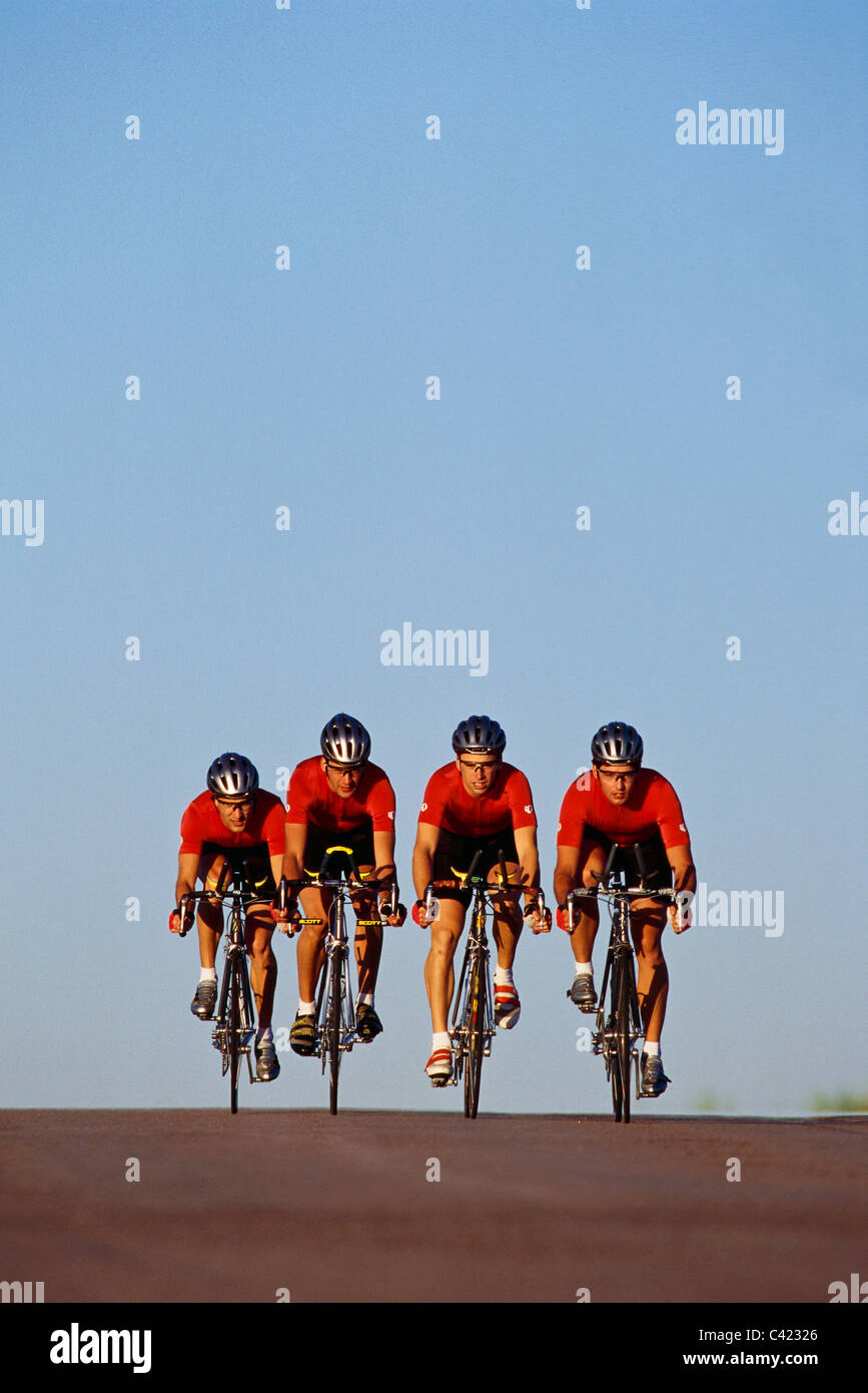 Road cycling team in action Stock Photo - Alamy