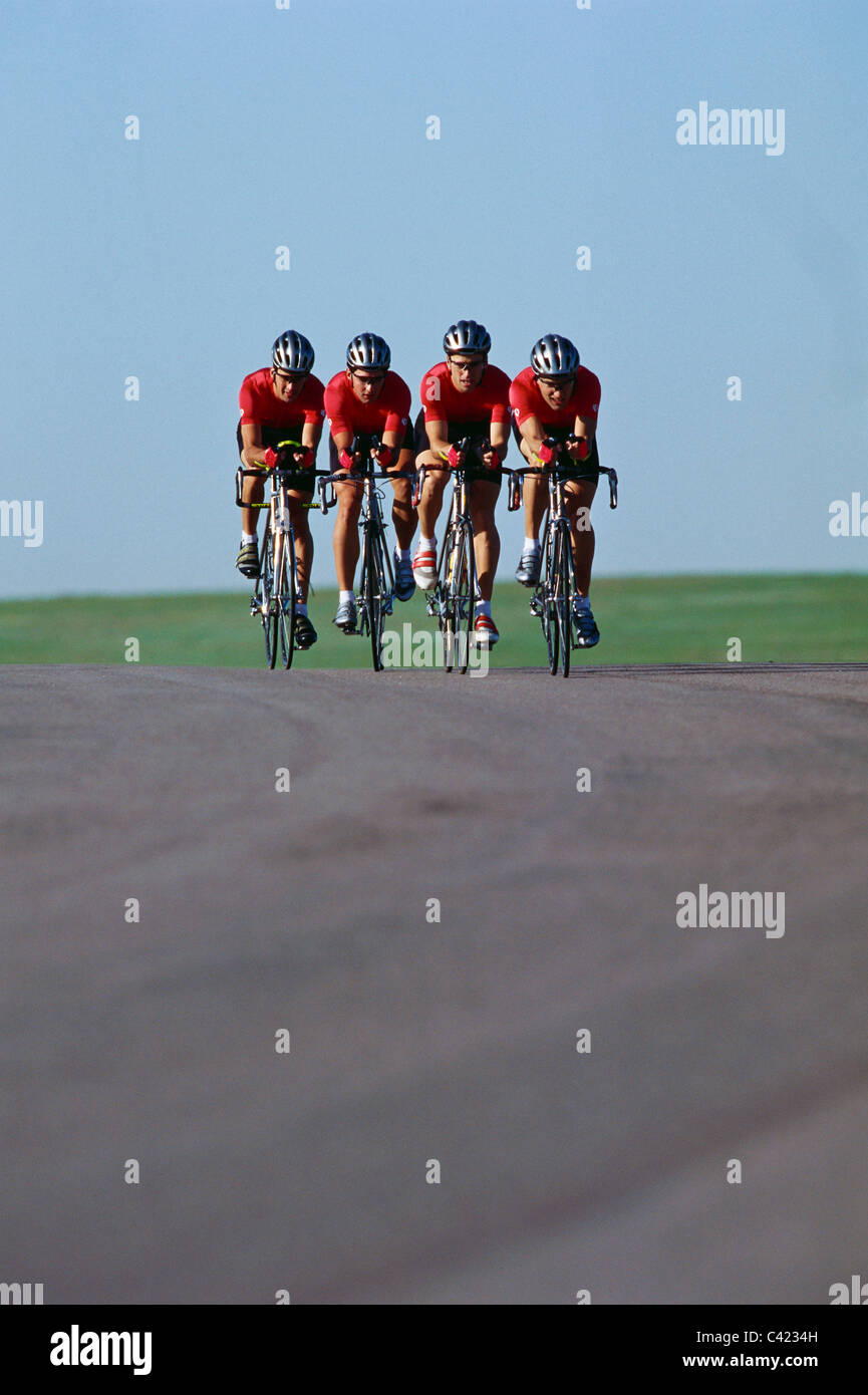 Road cycling team in action Stock Photo - Alamy