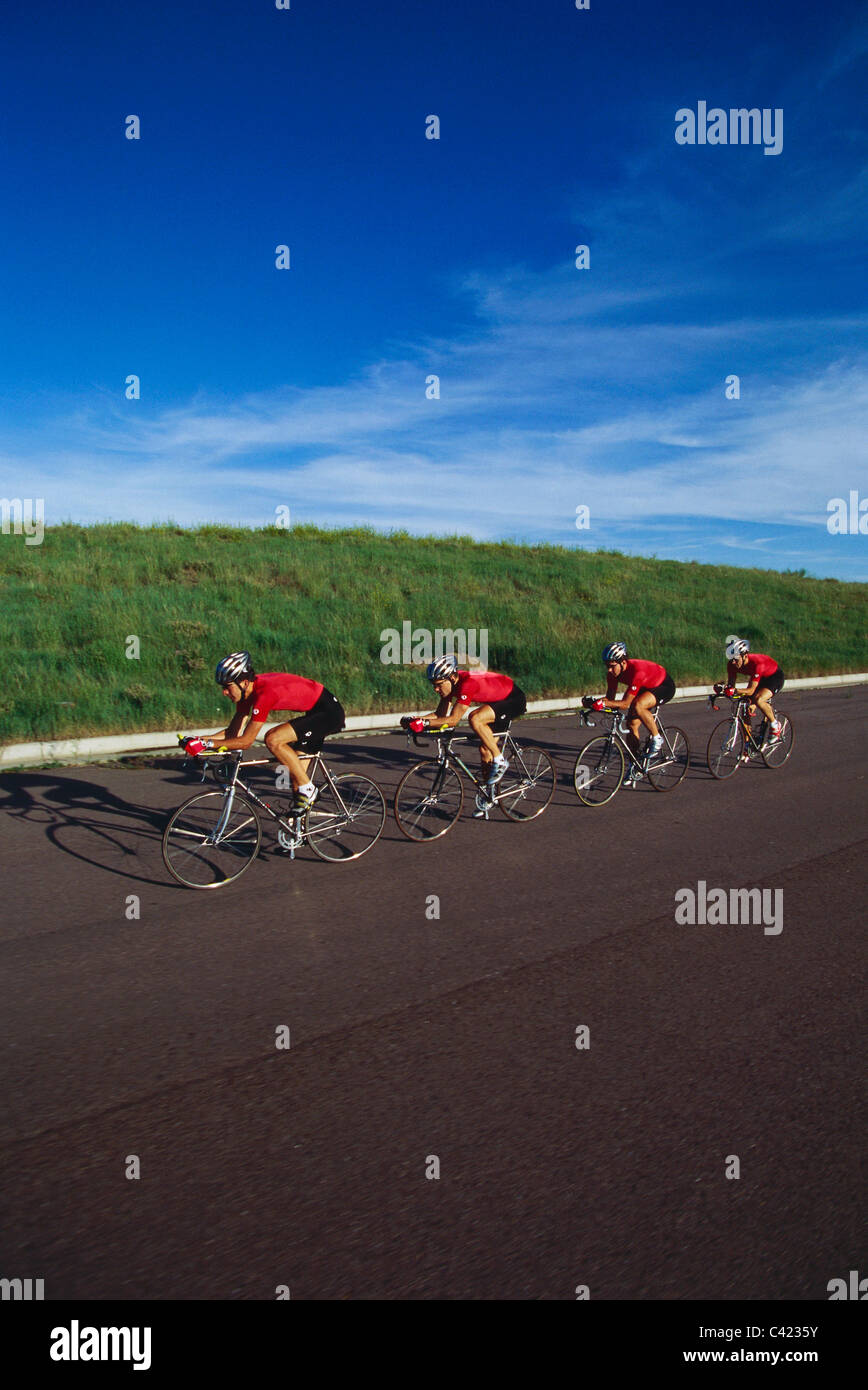 Road cycling team in action Stock Photo - Alamy
