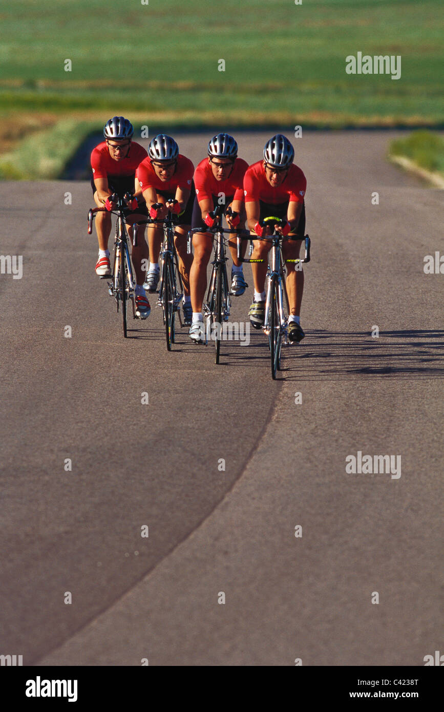Road cycling team in action Stock Photo - Alamy